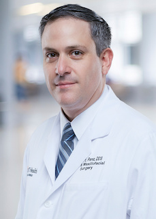 In addition to advanced arthroscopic surgery, he performs a large number of artificial TMJ ...